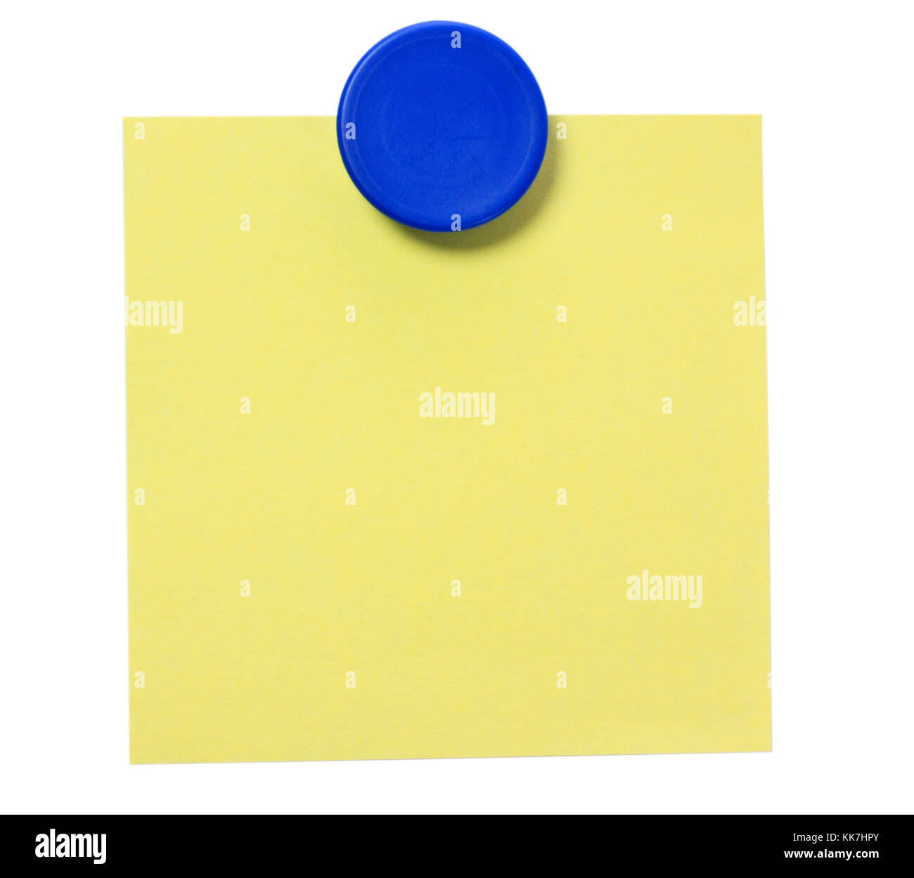 Yellow adhesive note and blue magnet button on whiteboard Stock Photo ...