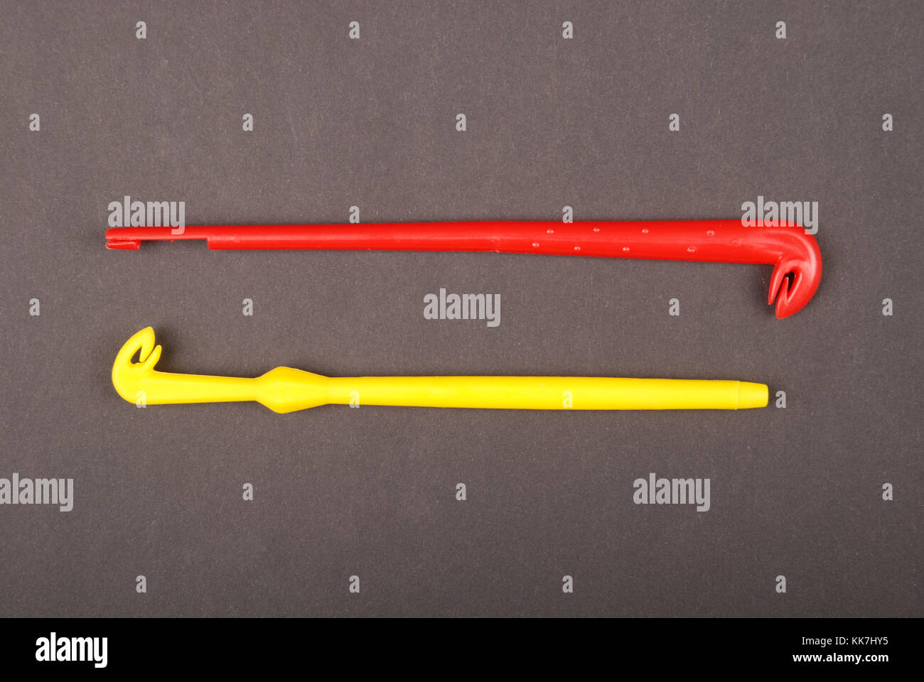 Red and yellow loop tier isolated on black background Stock Photo - Alamy