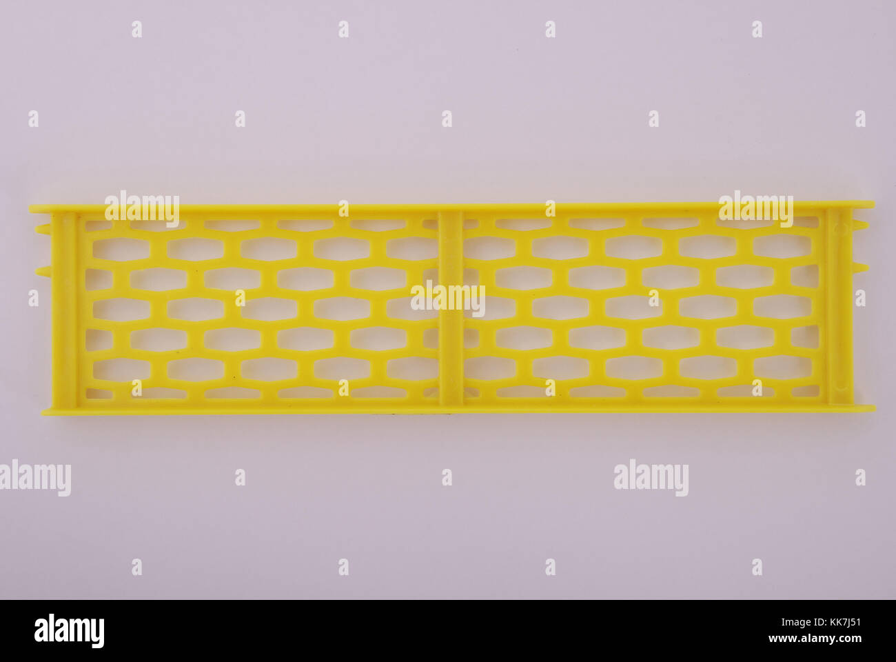 One yellow hair extender stops isolated on gray background Stock Photo ...