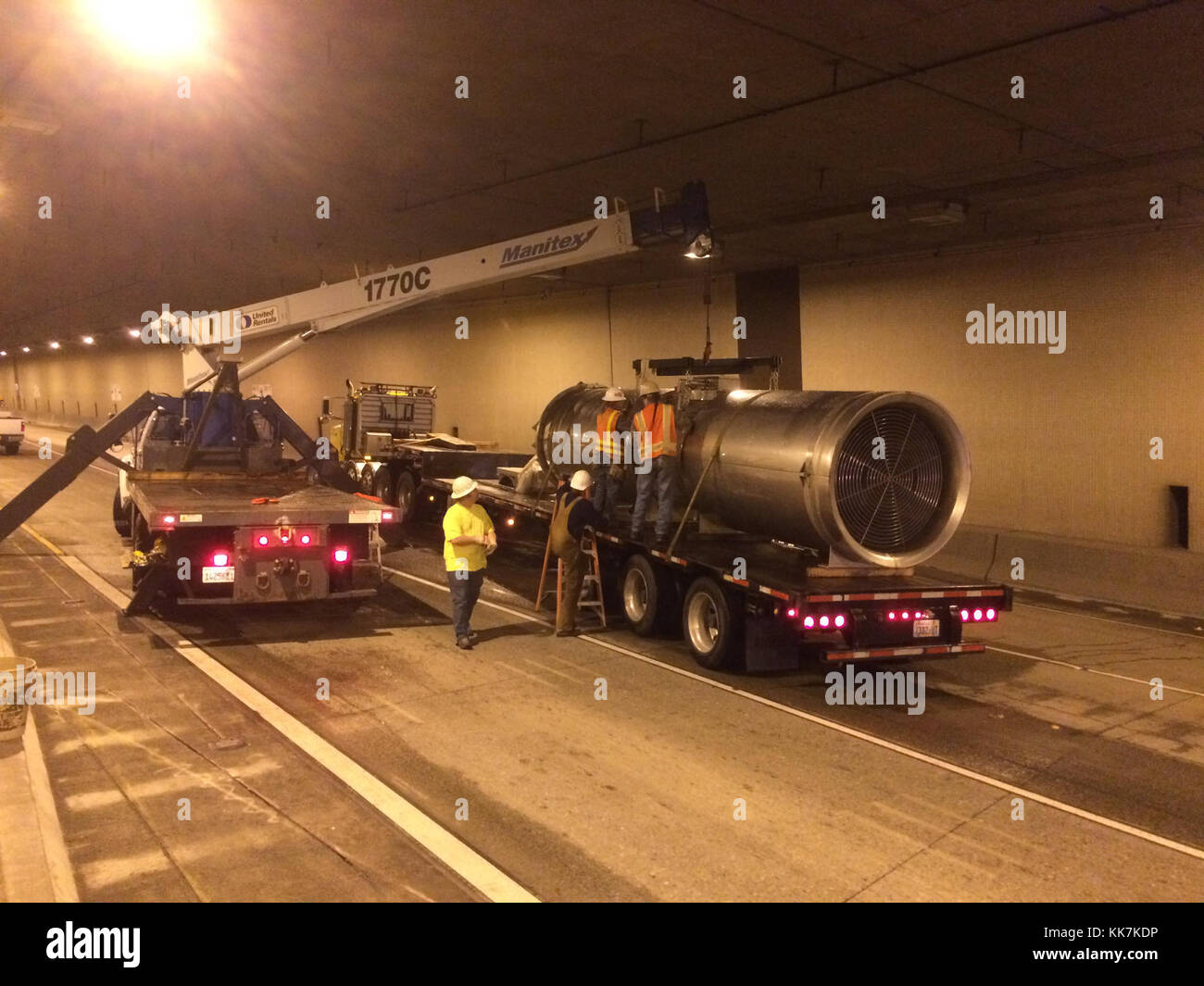 Contractor crews are installing 16 jet fans in the median of the ...