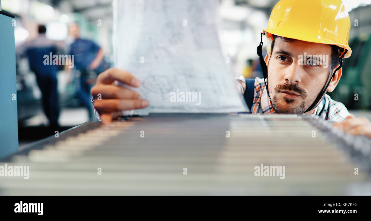 Supervisor doing quality control and pruduction check in factory Stock ...