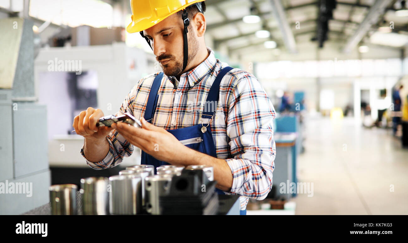 Portrait of an handsome engineer in a factory Stock Photo - Alamy
