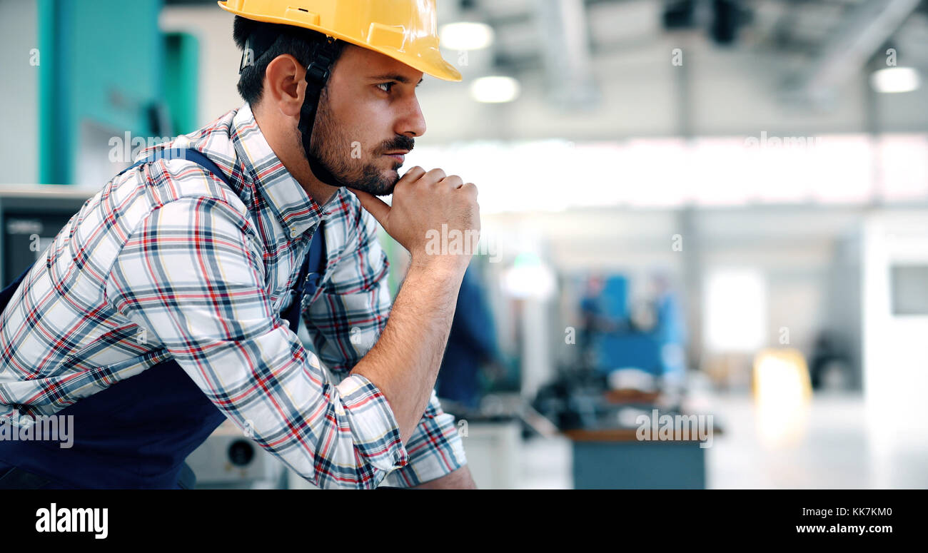 industrial factory employee working in metal manufacturing industry ...