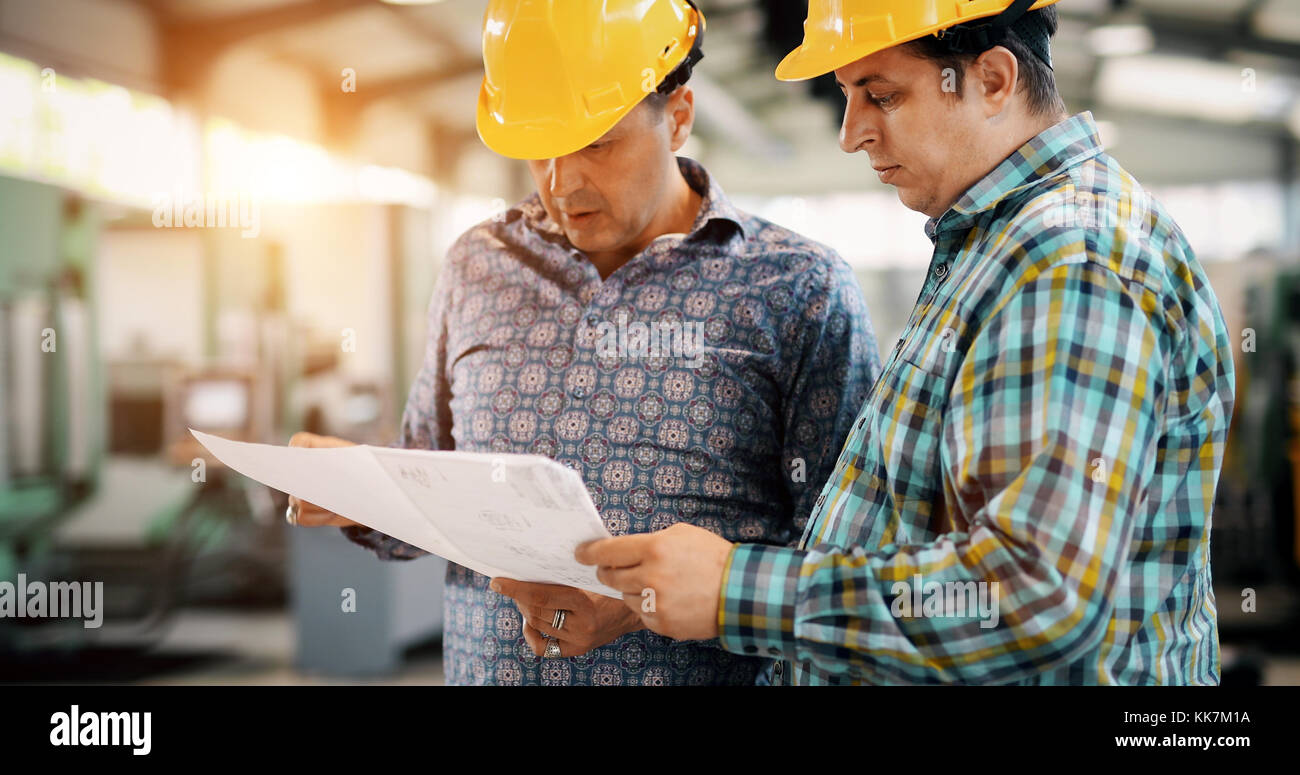 Portrait of an handsome engineer in a factory Stock Photo - Alamy