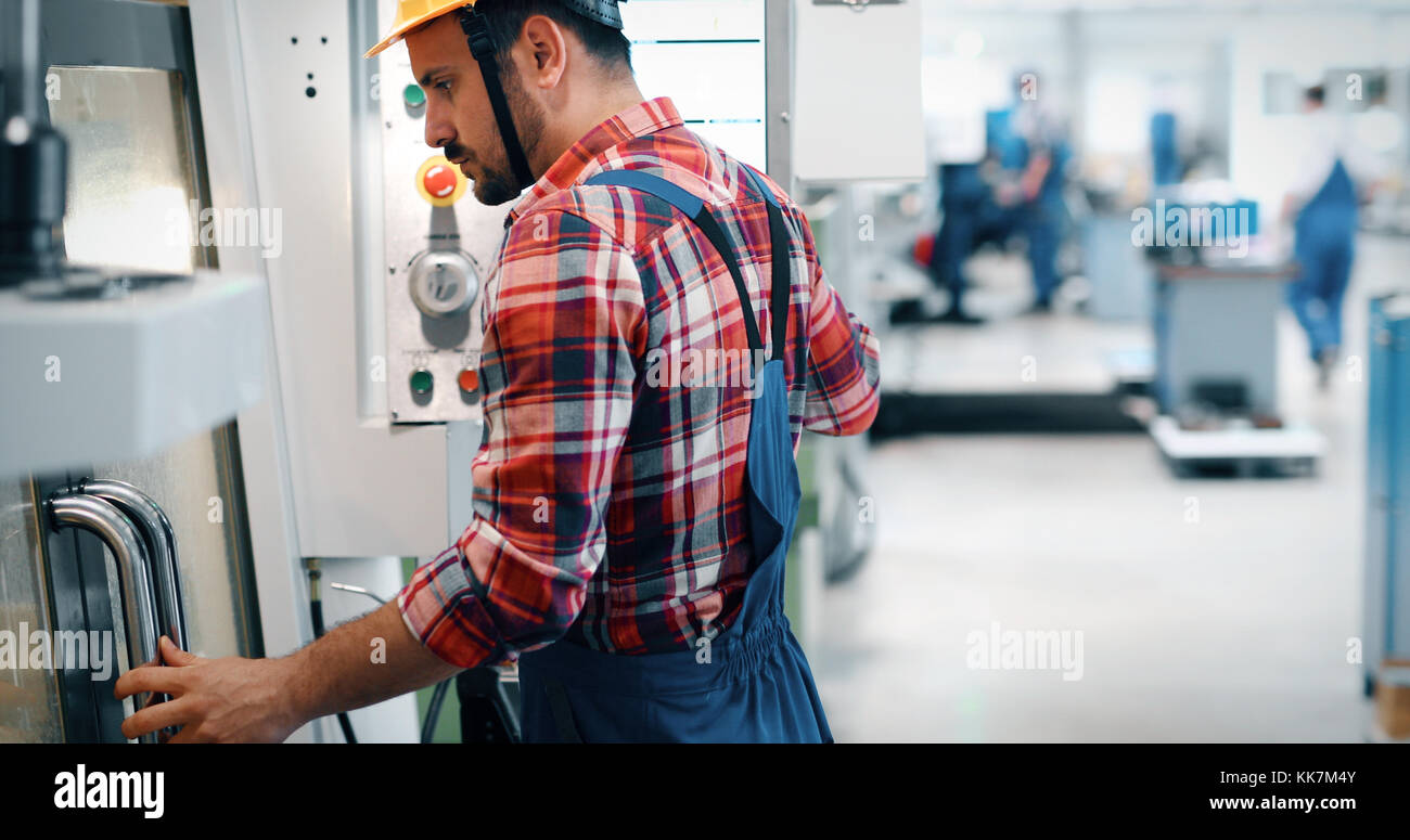 industrial factory employee working in metal manufacturing industry ...