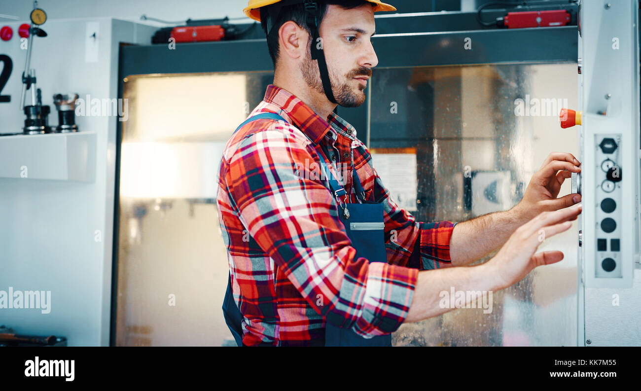 Portrait of an handsome engineer in a factory Stock Photo - Alamy
