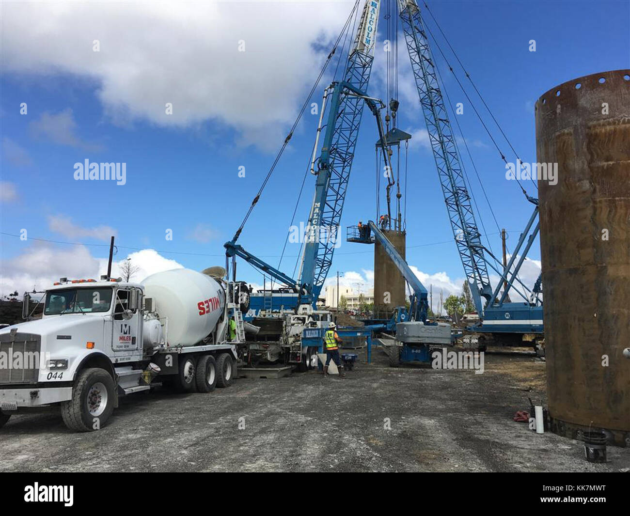 Construction crews pour concrete for a flyover shaft in Renton during ...