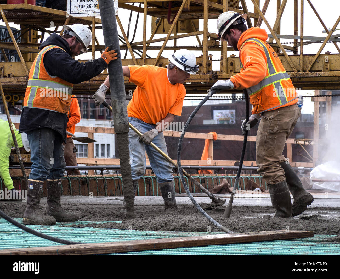 Crews working for contractor Interwest Construction pour and spread ...