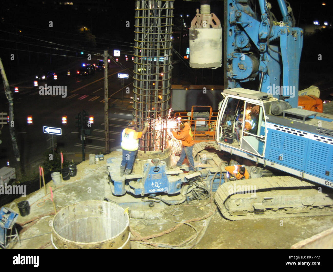 Construction crews working for WSDOT place drilled shafts underground ...