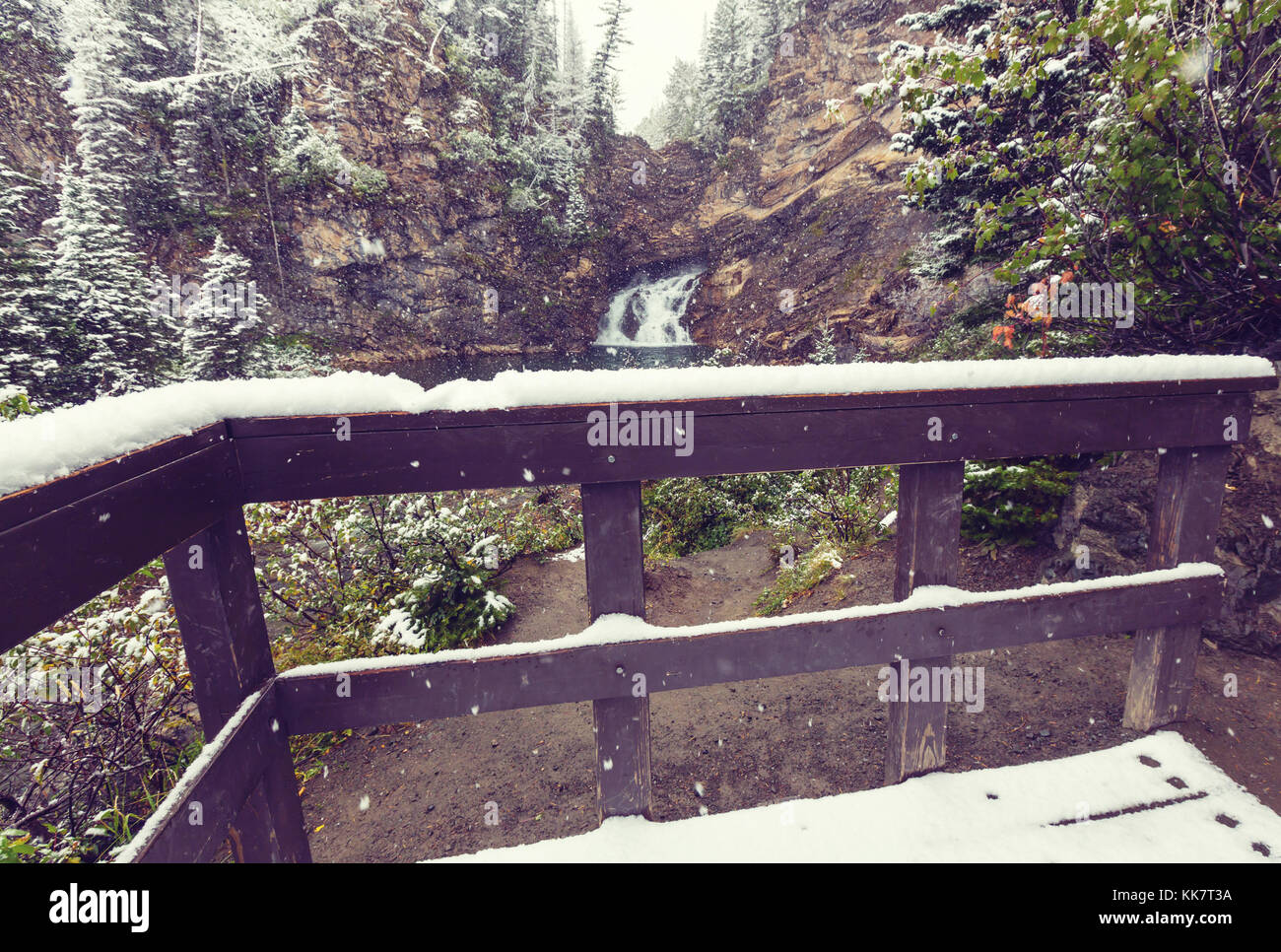 Early winter with first snow covering rocks and woods in the Glacier ...
