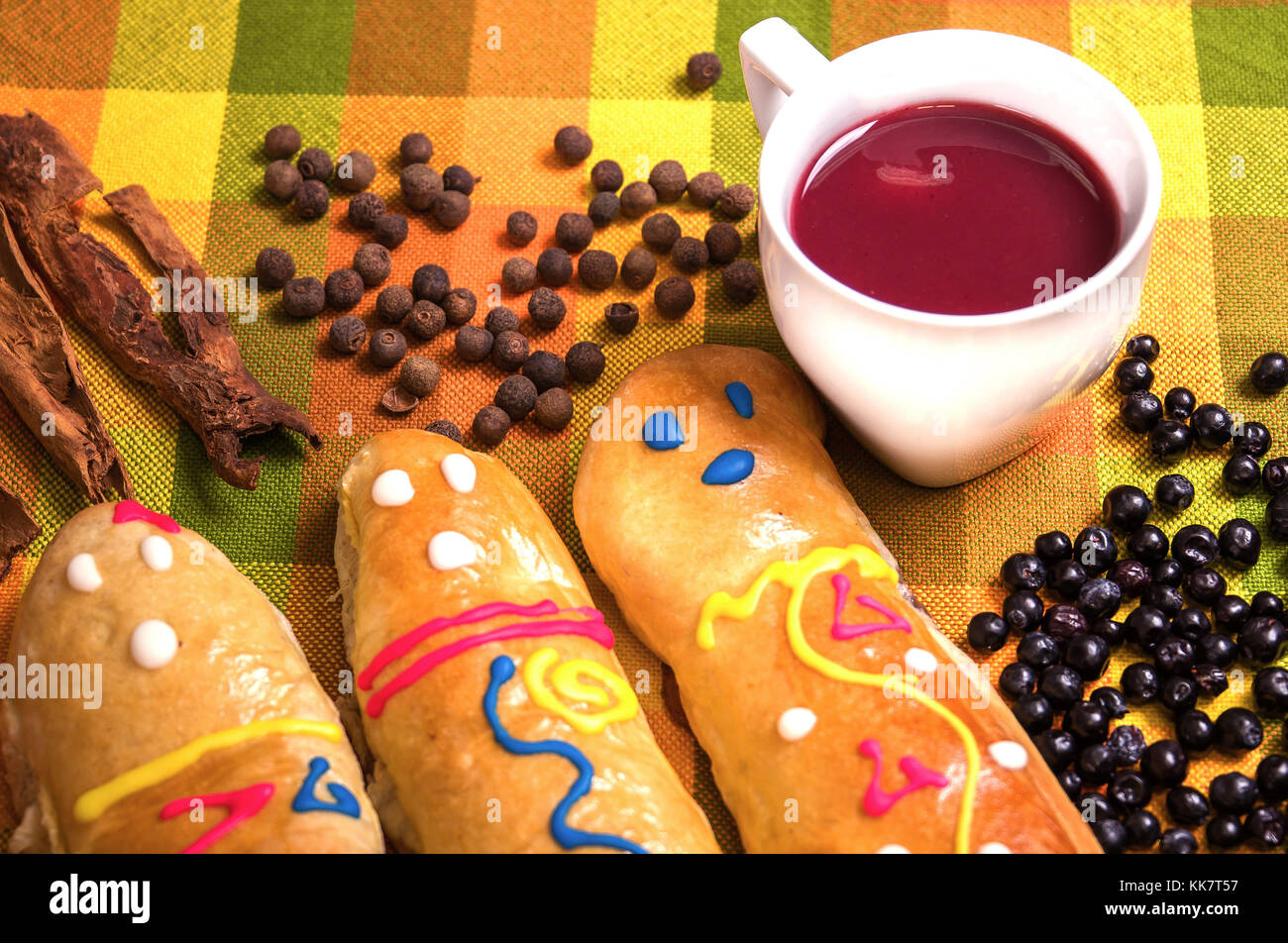 Close up of traditional Ecuadorian dish, colada morada and three ...