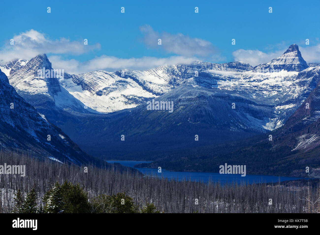 Early winter with first snow covering rocks and woods in the Glacier ...