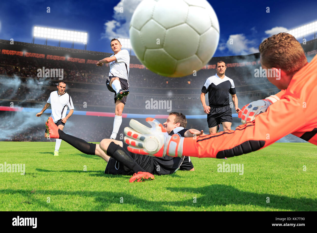 scenes from a soccer or football game with male player Stock Photo - Alamy