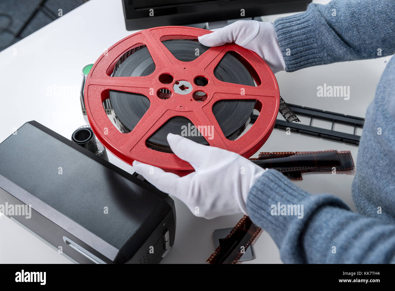 Holding 16mm film strip hi-res stock photography and images - Alamy