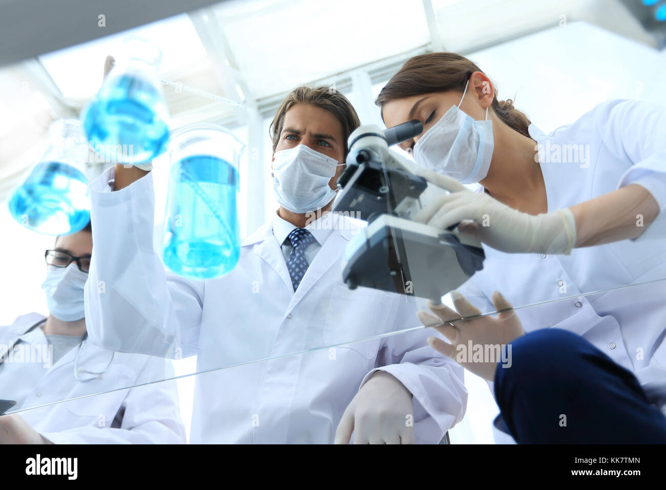 scientists conducting research in a lab environment Stock Photo - Alamy