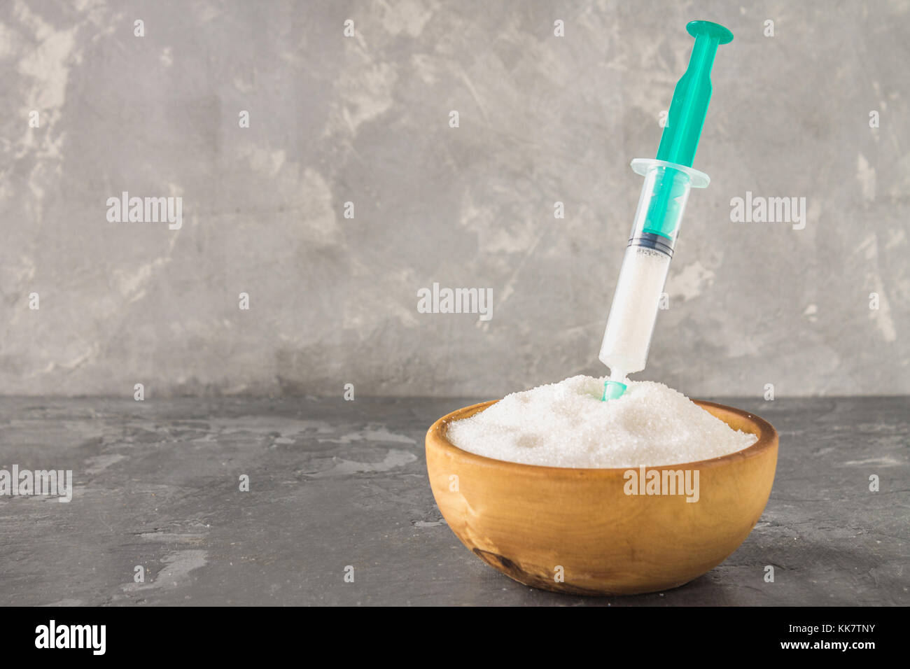 Sugar in a syringe. Conceptual depiction of dependence on the sweet ...