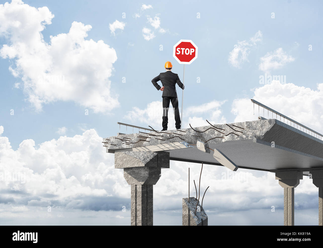 Confident engineer holding street safety sign Stock Photo - Alamy