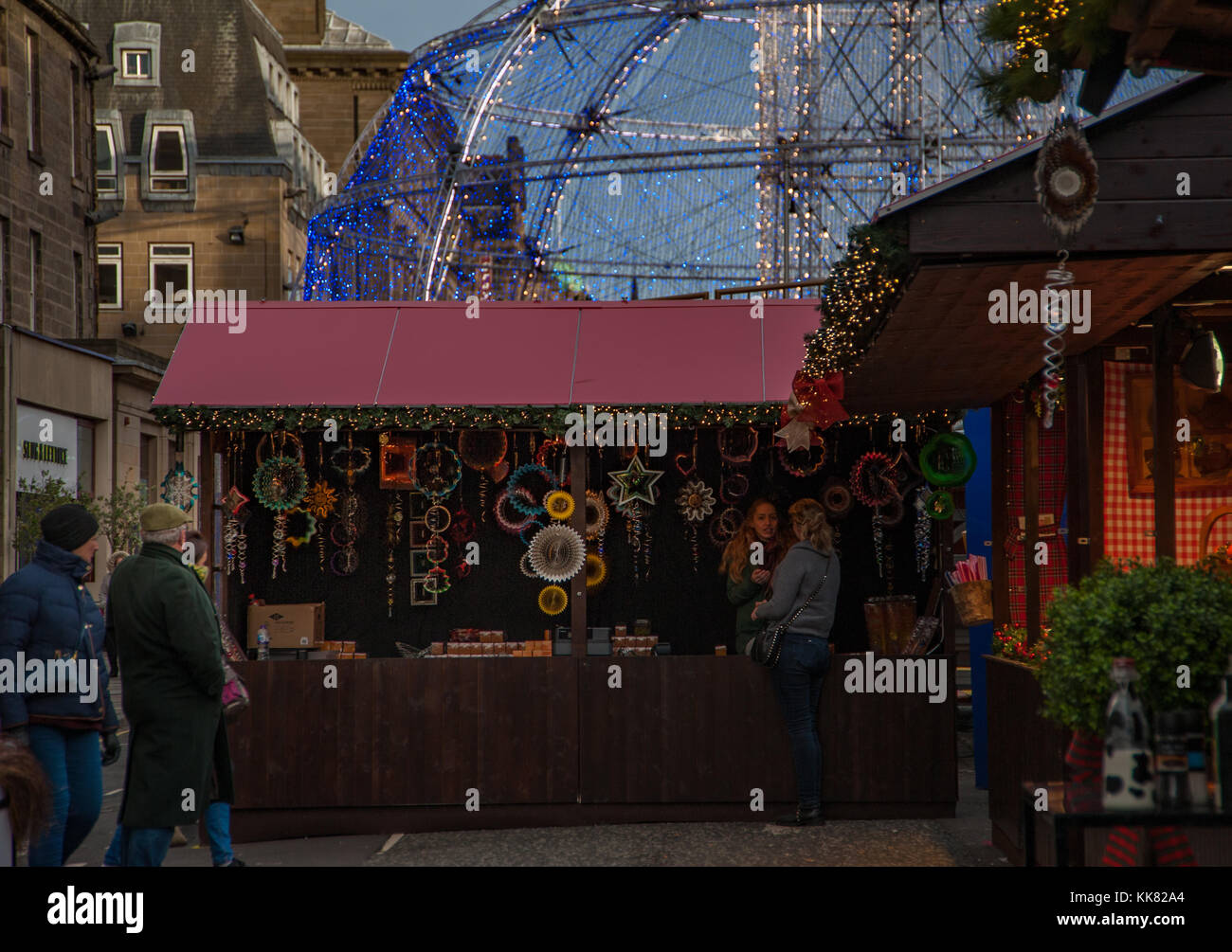 Christmas market shops with light dome on George street, Edinburgh ...