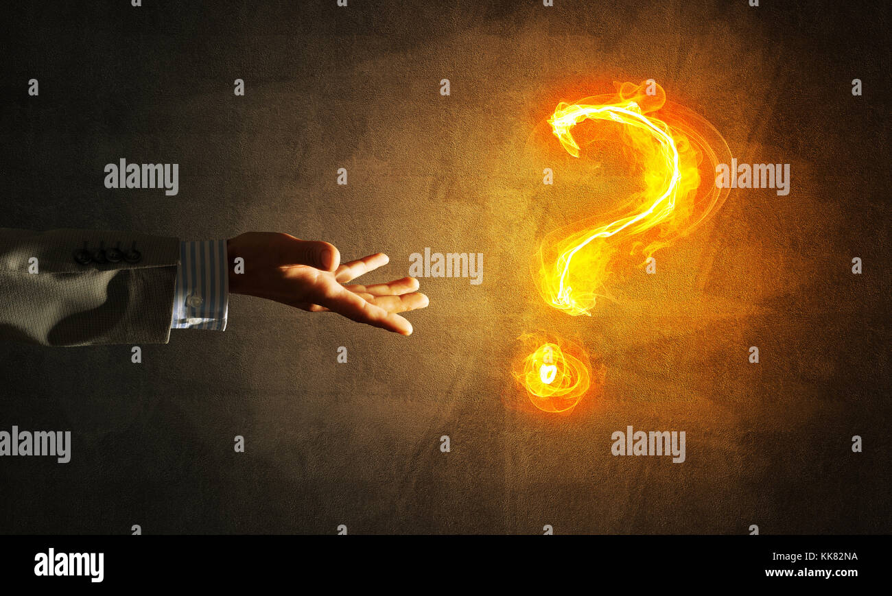 Concept of help or support with fire burning question mark Stock Photo ...