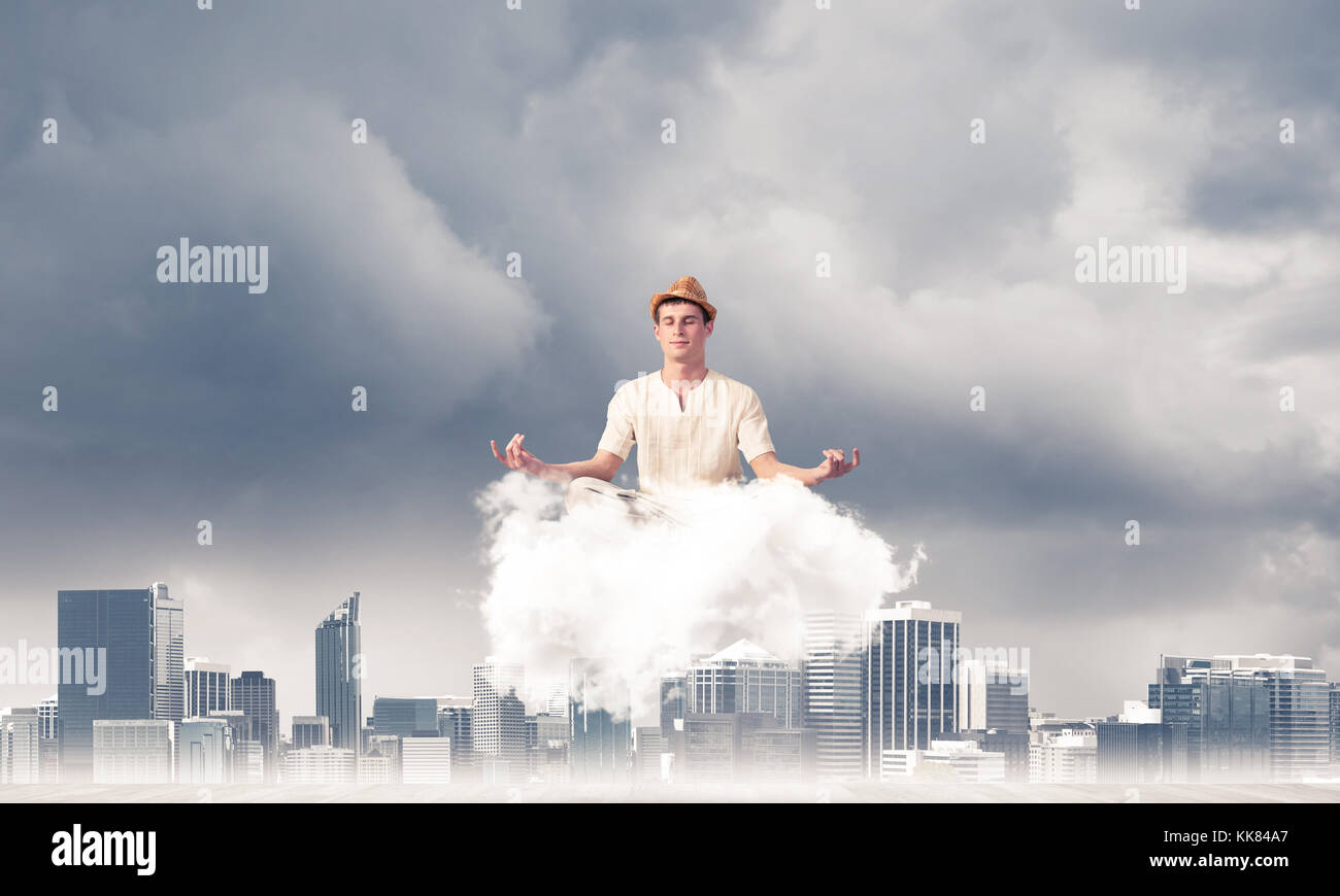 Young man keeping mind conscious Stock Photo - Alamy