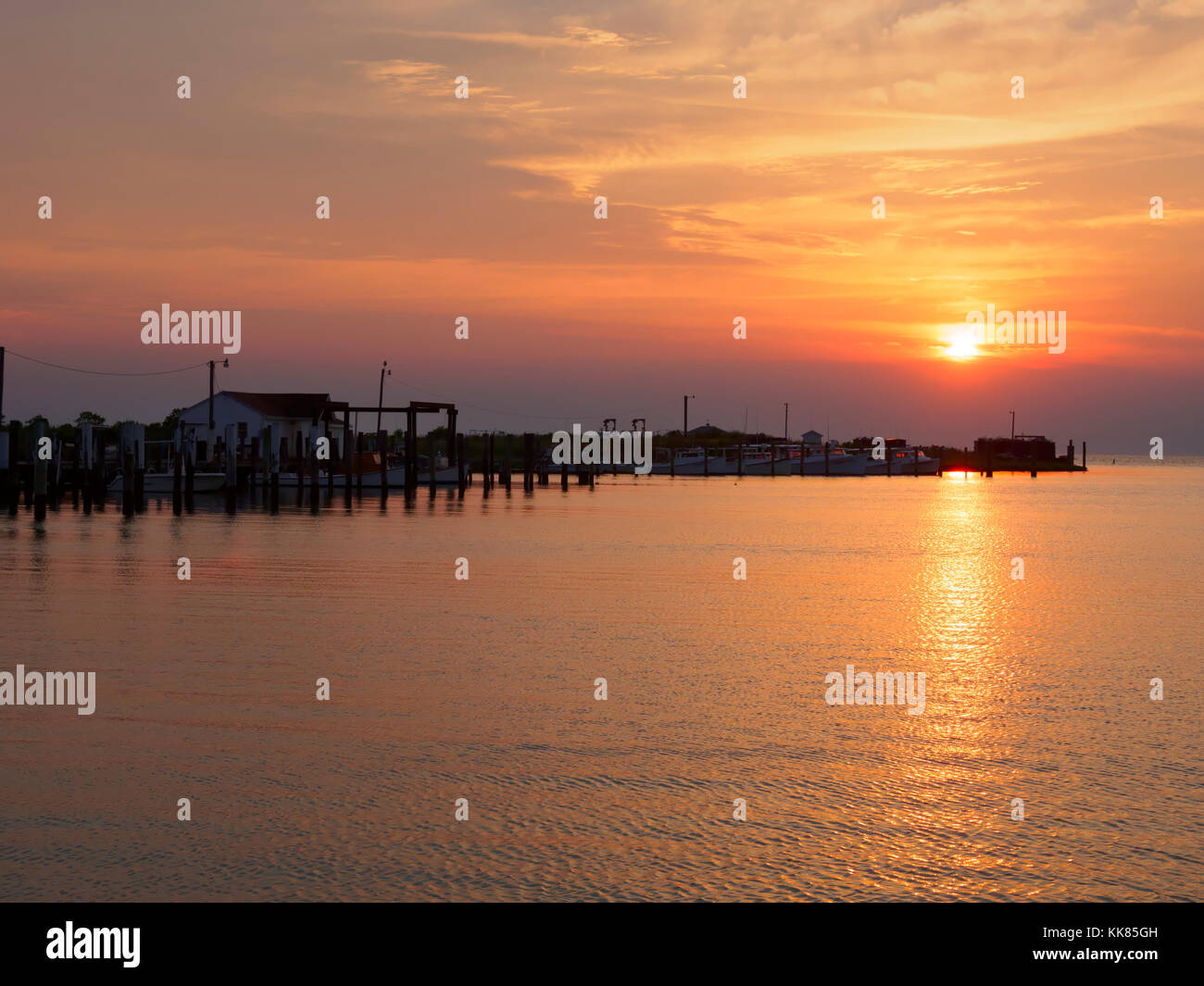 Fishing shanties at sunset, Tangier Island, Chesapeake Bay Stock Photo ...