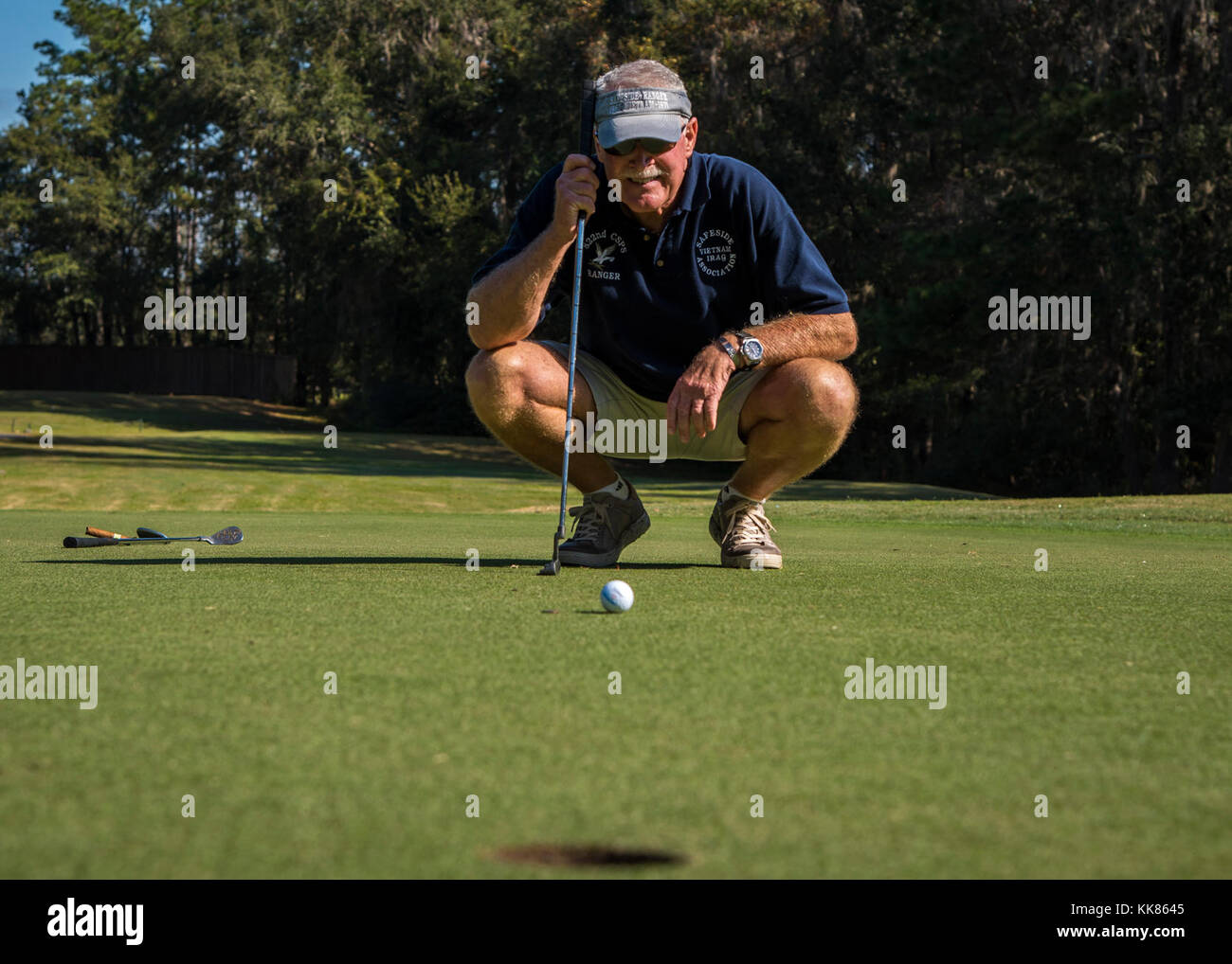 Retired Sergeant, Alan Fox prepares for a shot during a Safeside ...