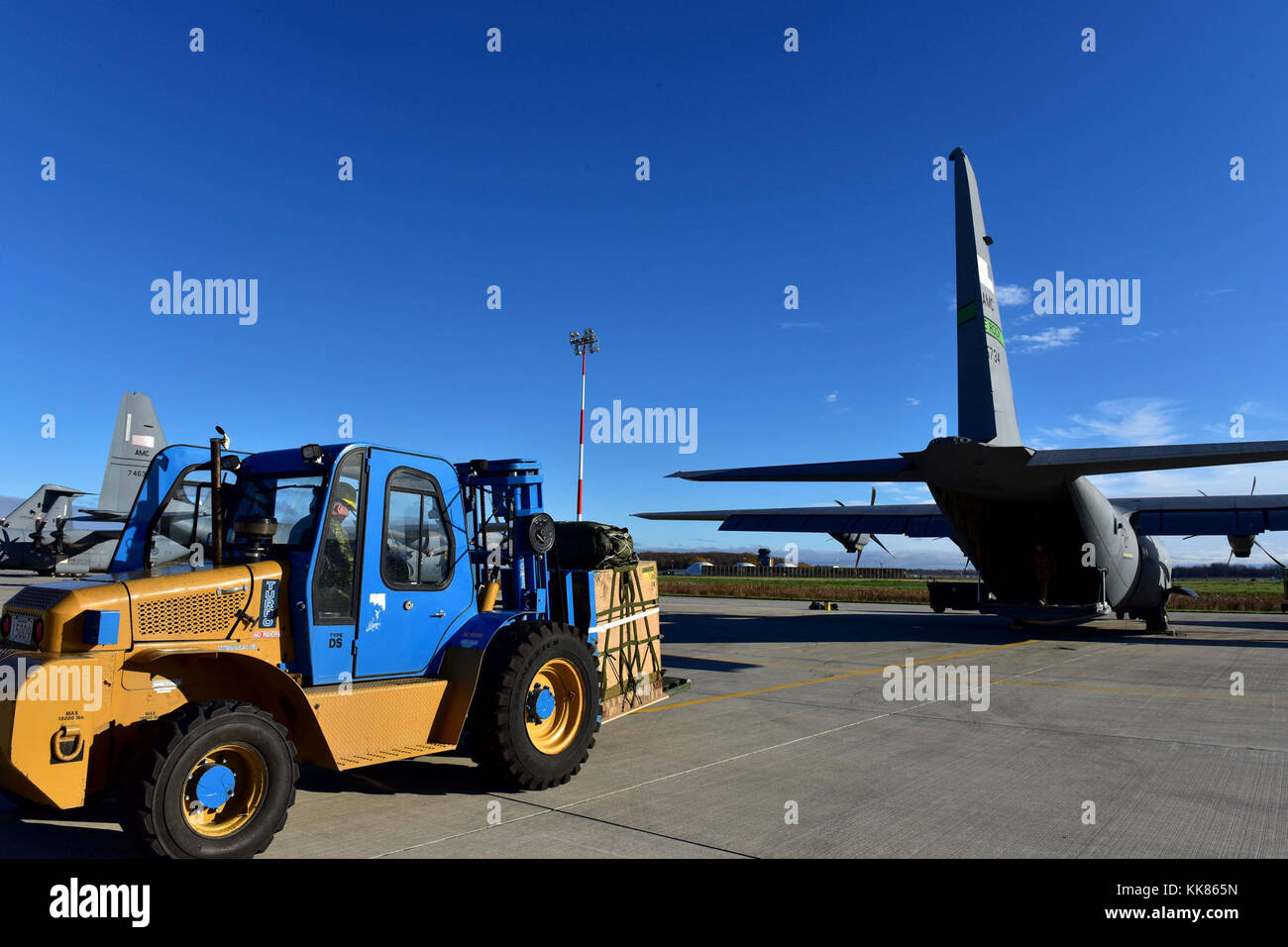Royal Canadian Air Force traffic technicians load Container Delivery ...
