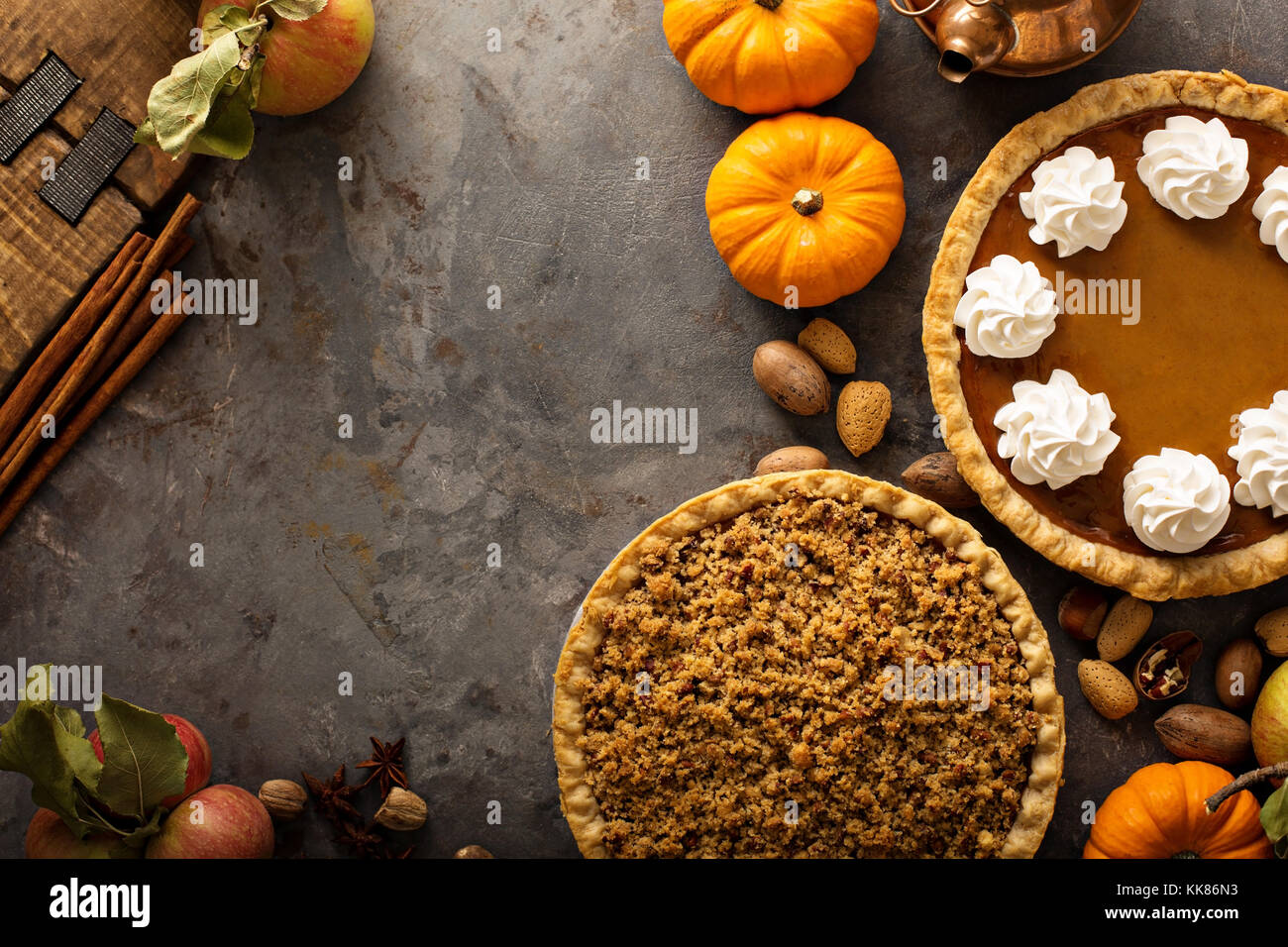 Fall traditional pies pumpkin, pecan and apple crumble Stock Photo - Alamy