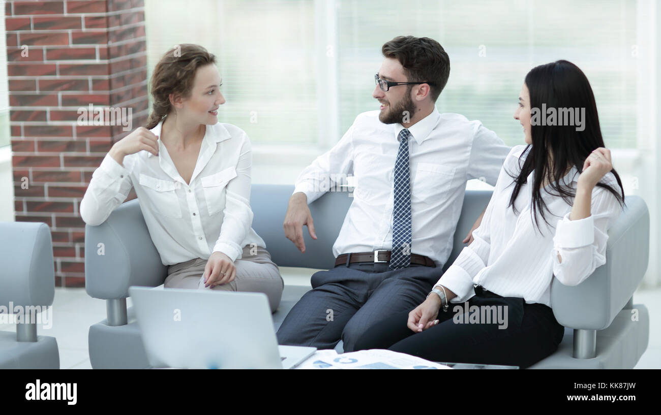 employees of the company sitting in the lobby of a modern office Stock ...