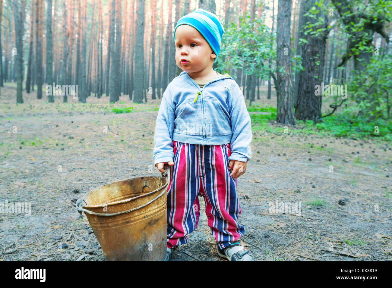 Young boy playing in park Stock Photo - Alamy