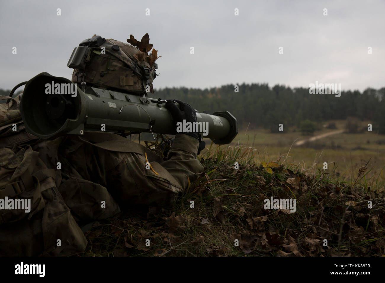 A U.S. Soldier of 2nd Cavalry Regiment, prepares to fire a M136E1 AT4 ...