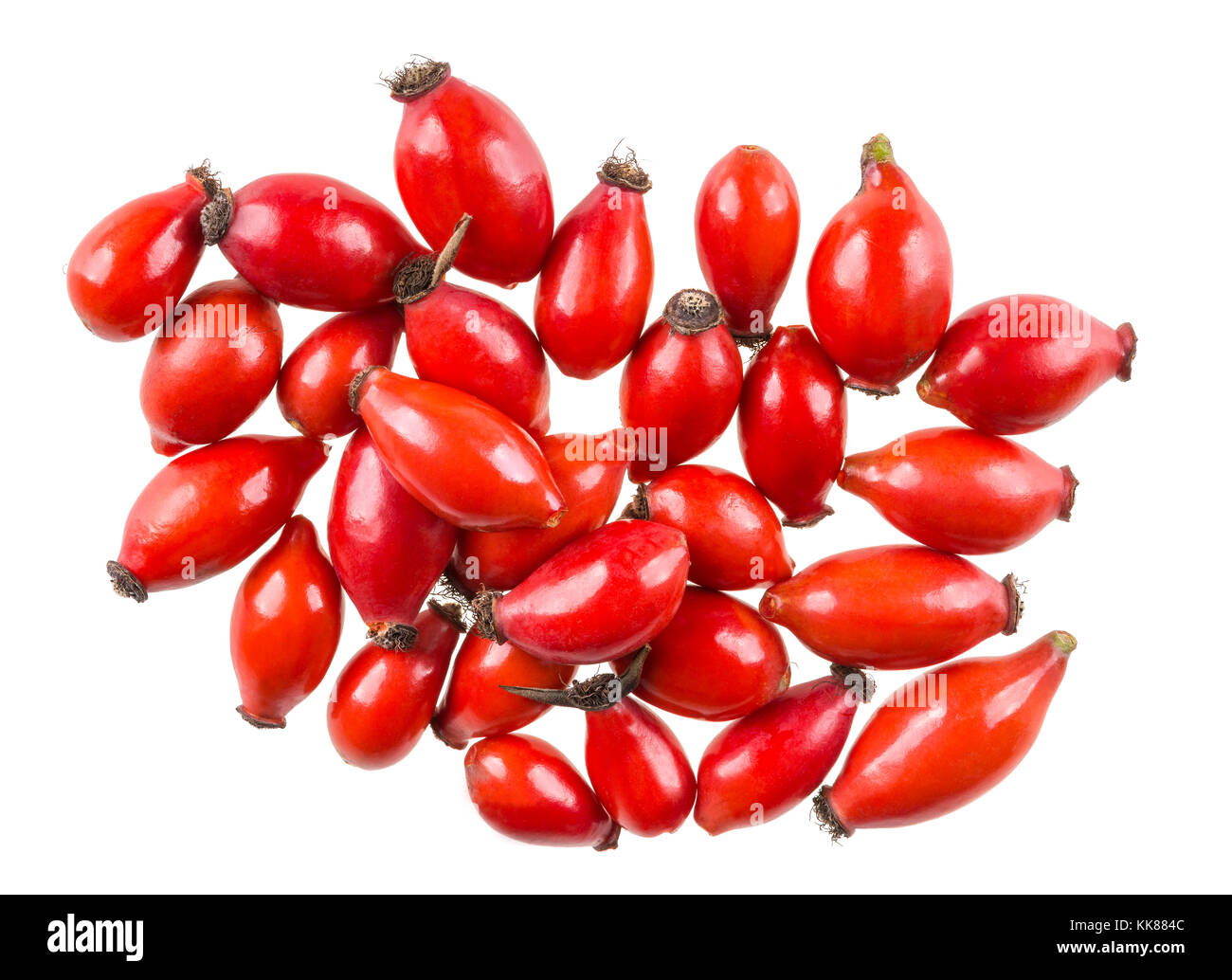 Small heap of beautiful red rose hips. Ripe medicinal rosehips ...