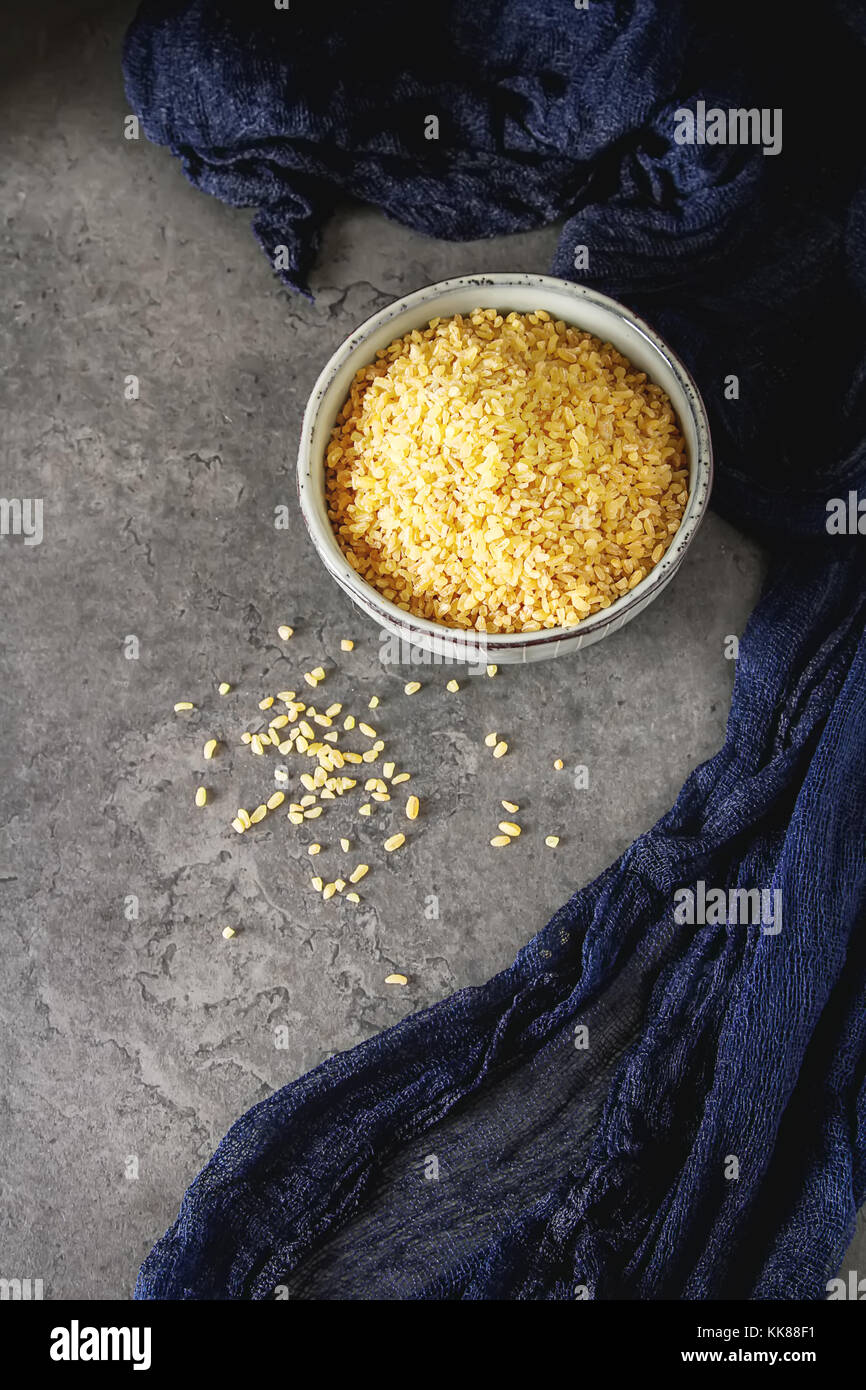 Bulgur on a dark background. Vegetarian Oriental food Stock Photo - Alamy