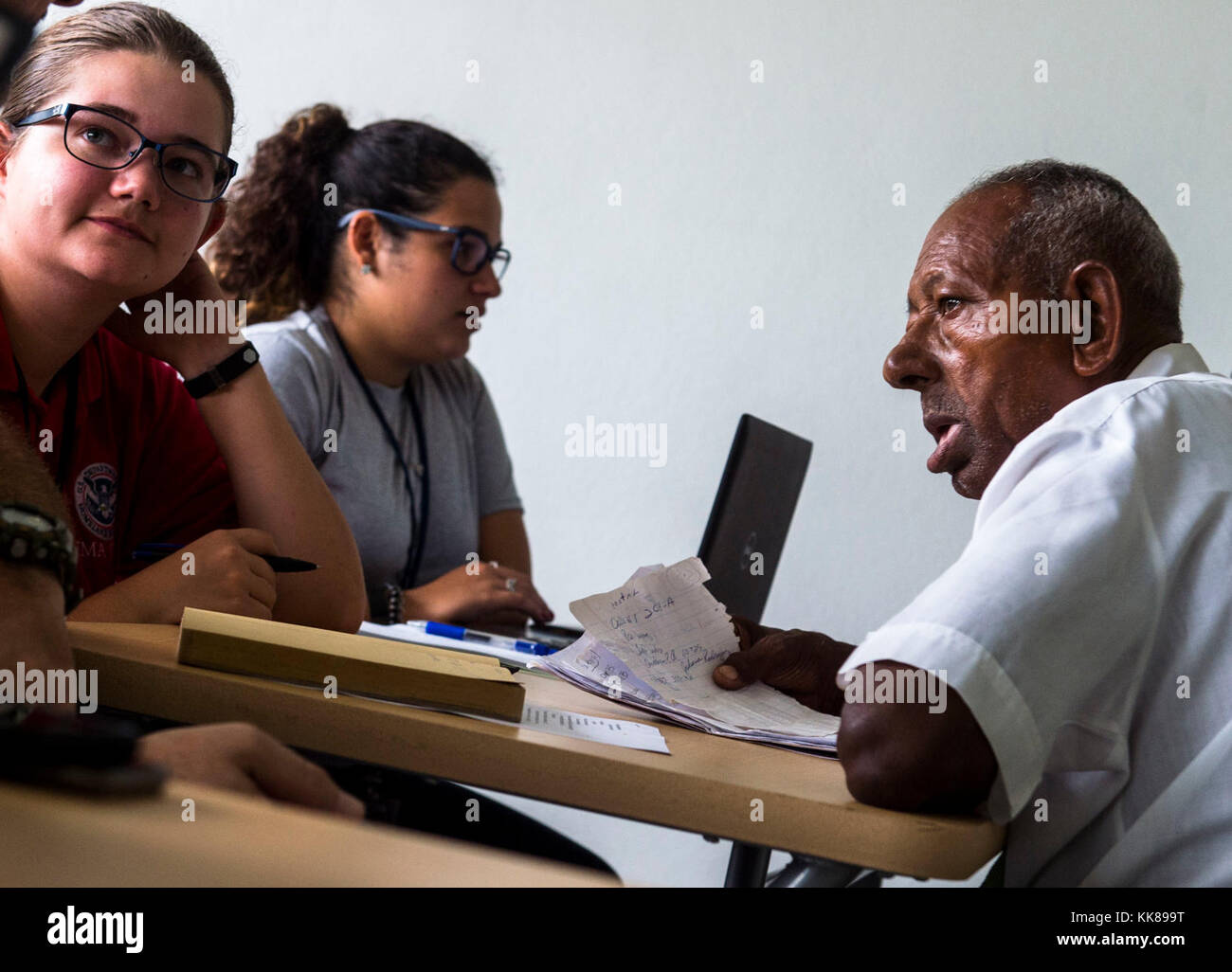 Federal volunteers work with the Federal Emergency Management Agency ...