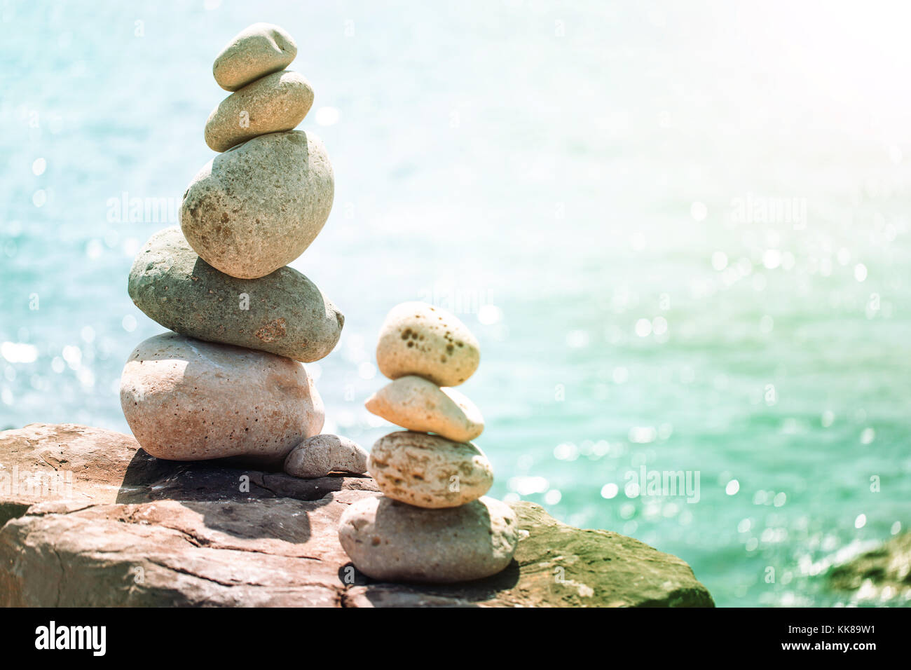 Stacks of stones on the ocean or sea shore Stock Photo - Alamy