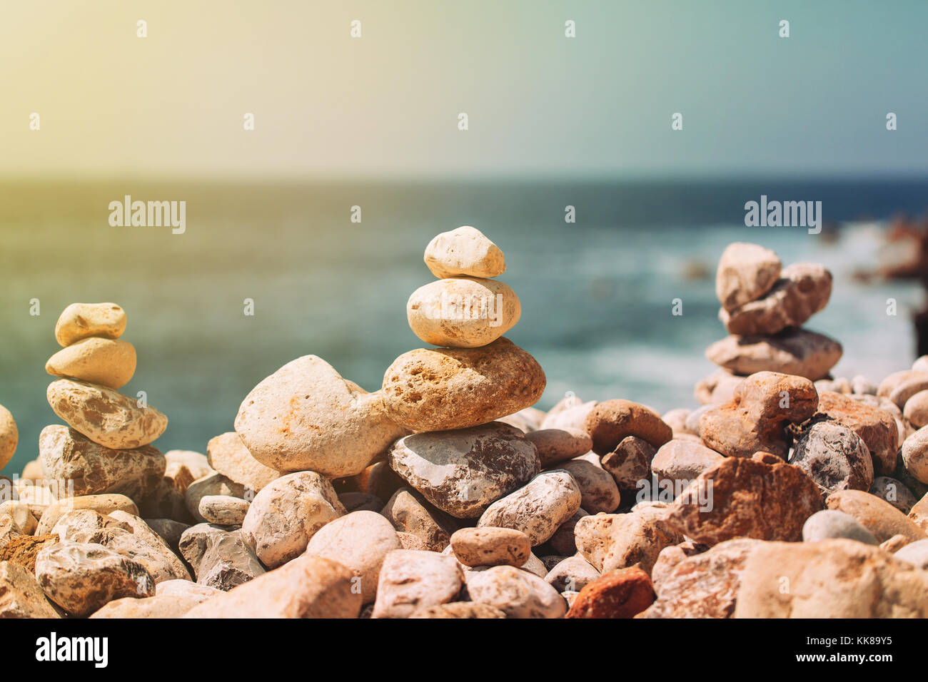 Stacks of stones on the ocean or sea shore Stock Photo - Alamy