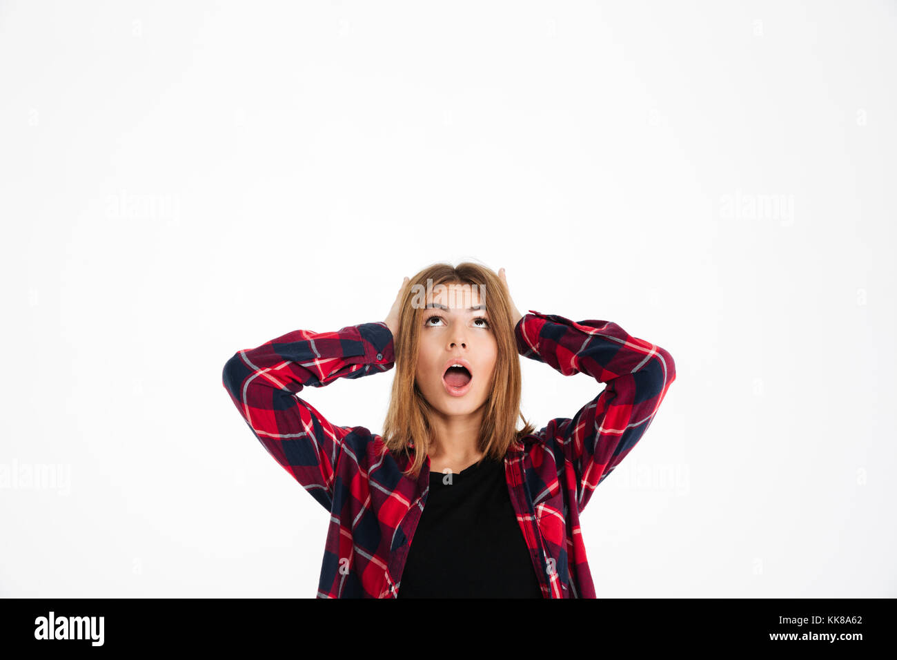 Image of shocked screaming young woman standing isolated over white ...