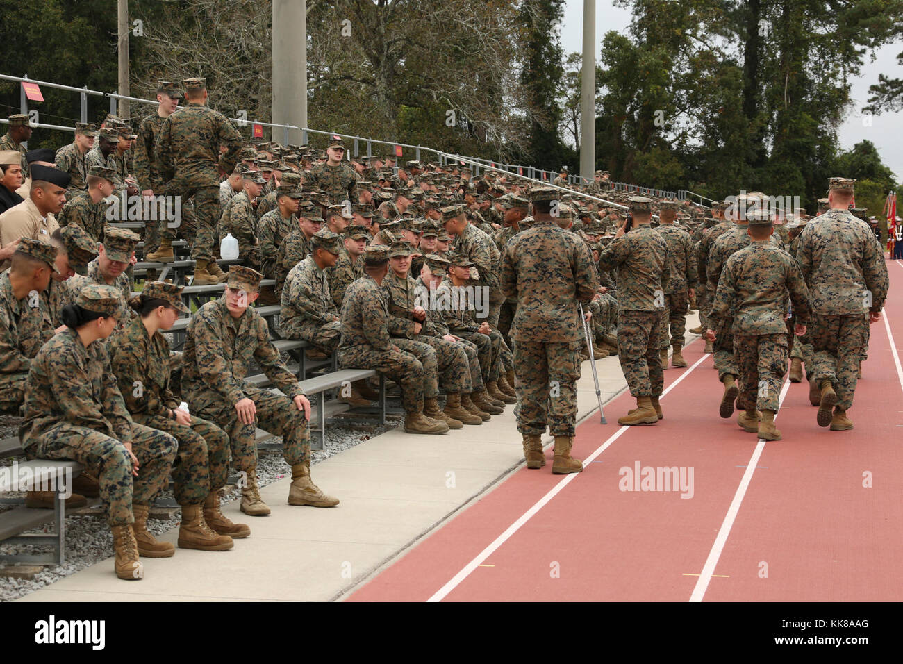 U.S. Marines move into the stadium to take their seats before the Joint ...
