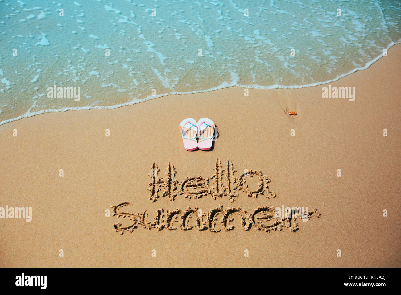 Text hello summer on ocean sand beach Stock Photo - Alamy
