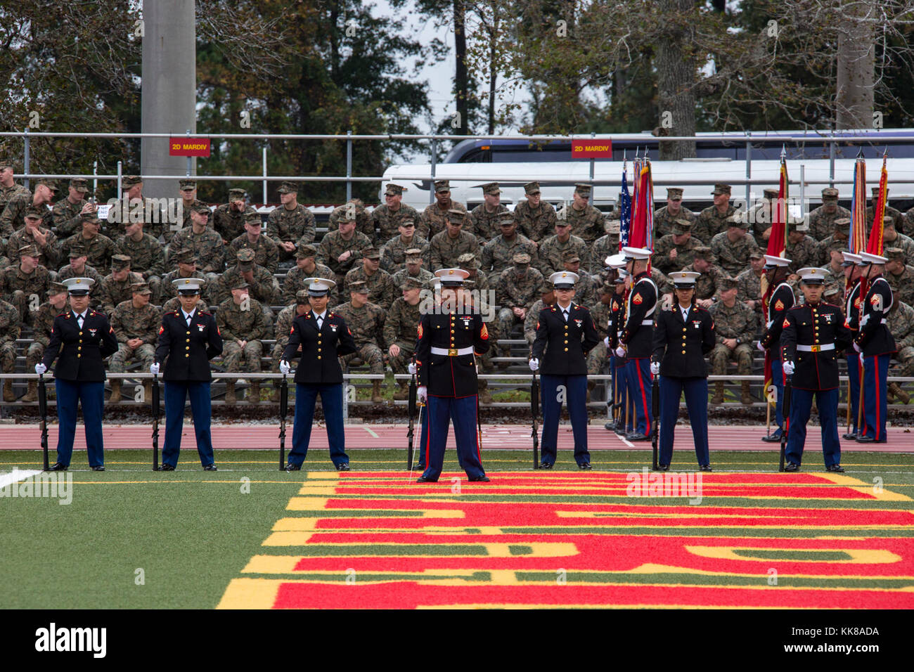 U.S. Marines with the rifle detail stand at parade rest during the ...