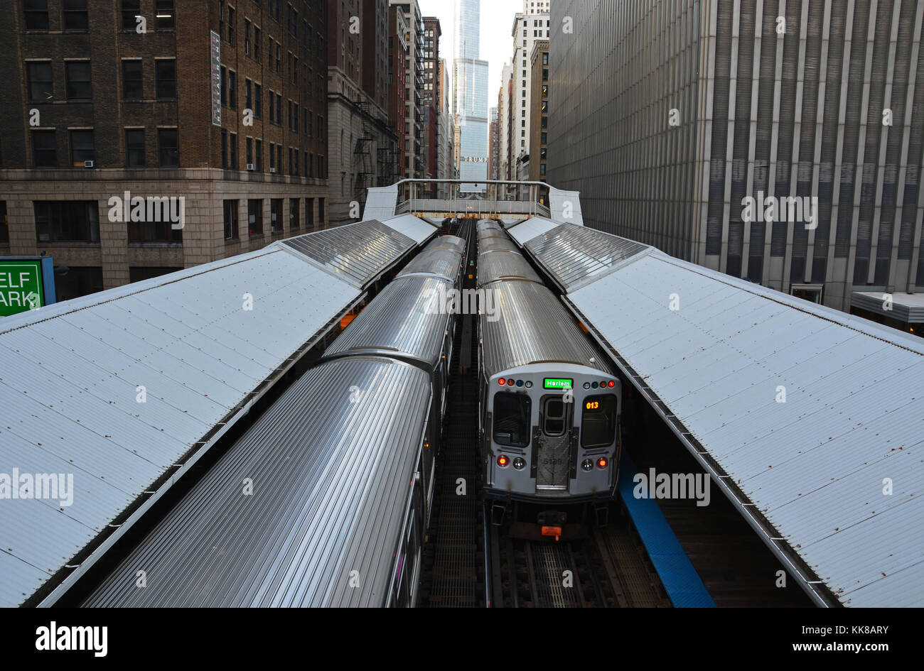 A train for the Green Line picks up passengers at the Adams/Wabash L ...