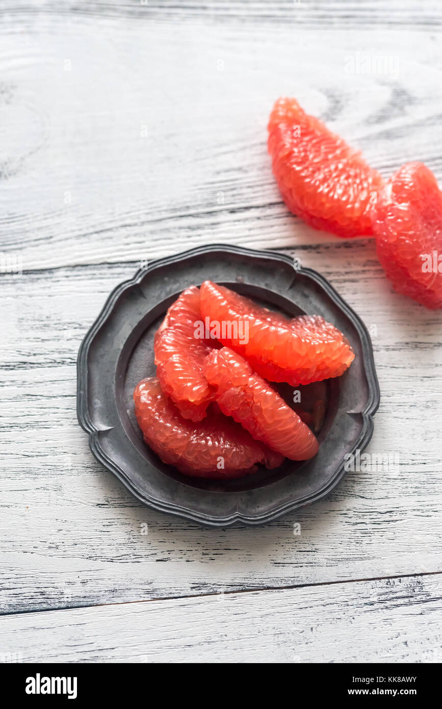Peeled grapefruit on the table Stock Photo - Alamy