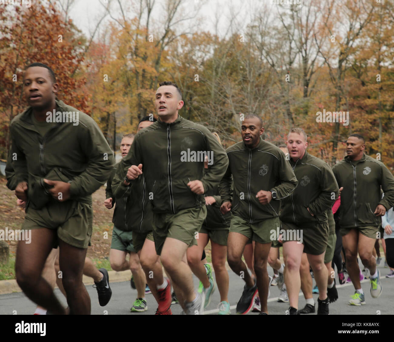 U.S. Marines with Manpower and Reserve Affairs run in formation on ...