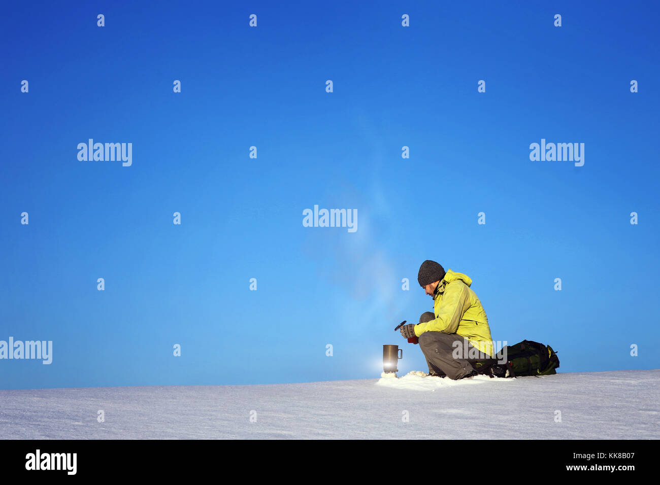 Climber in a snow storm Stock Photo - Alamy