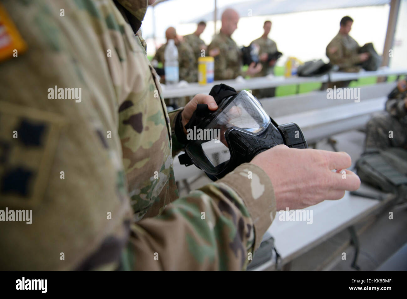 U.S. Soldiers with 650th Military Intelligence Group wash their M50 ...