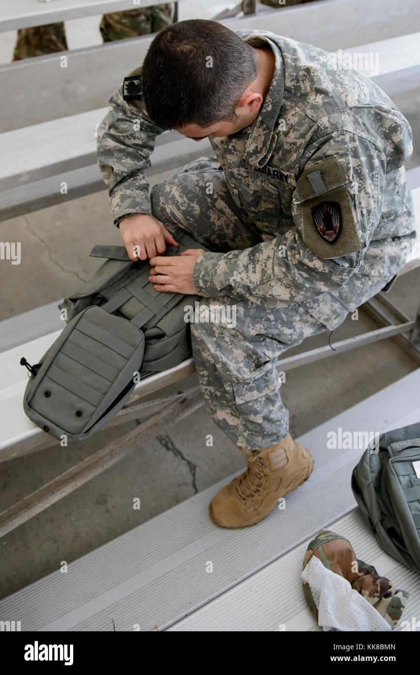 A U.S. Soldier with 650th Military Intelligence Group washes his M50 ...