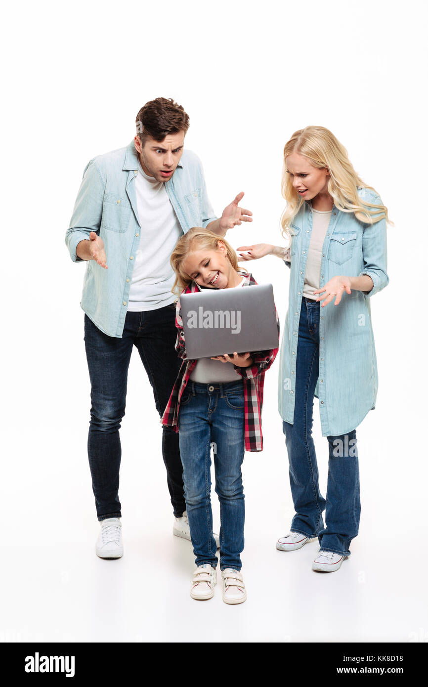 Full length portrait of an irritated family having and argument with a ...
