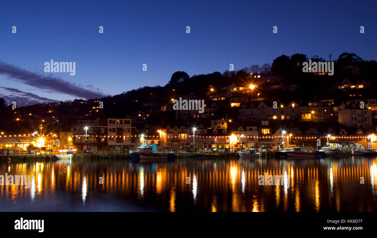 Lights and boats on the edge of the harbour, on a winter evening Stock ...