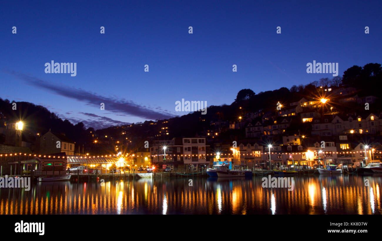 Lights and boats on the edge of the harbour, on a winter evening Stock ...