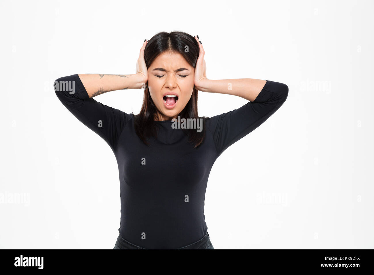 Close-up photo of young asian woman with closed eyes screaming while ...